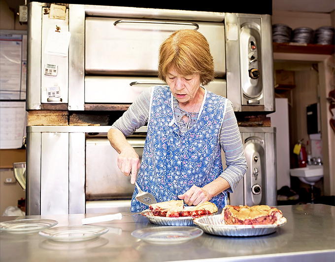 The artisans at work, crafting edible masterpieces with practiced hands. Like watching Michelangelo, but instead of marble, the medium is butter, sugar, and flour.