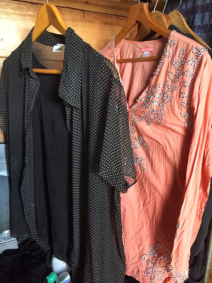 Fashion finds that span decades. That polka dot blouse paired with the coral embroidered top? Instant vintage style that costs less than lunch.