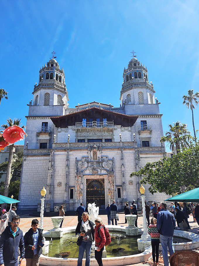 Tourists gather at the entrance, their expressions a universal language that translates to: "My house suddenly feels very, very inadequate."