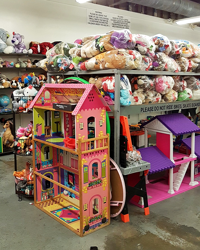 Dollhouses and stuffed animals create a colorful playground where childhood dreams get recycled into new memories at a fraction of retail prices.