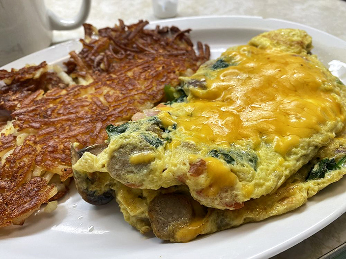 This isn't just any omelet&mdash;it's a cheese-blanketed sleeping bag for vegetables that somehow makes eating greens feel rebellious and indulgent.