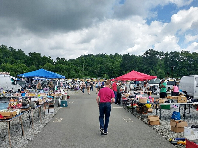 The main artery of commerce, where weekend warriors hunt for bargains under a patchwork of tents and Pennsylvania sky.