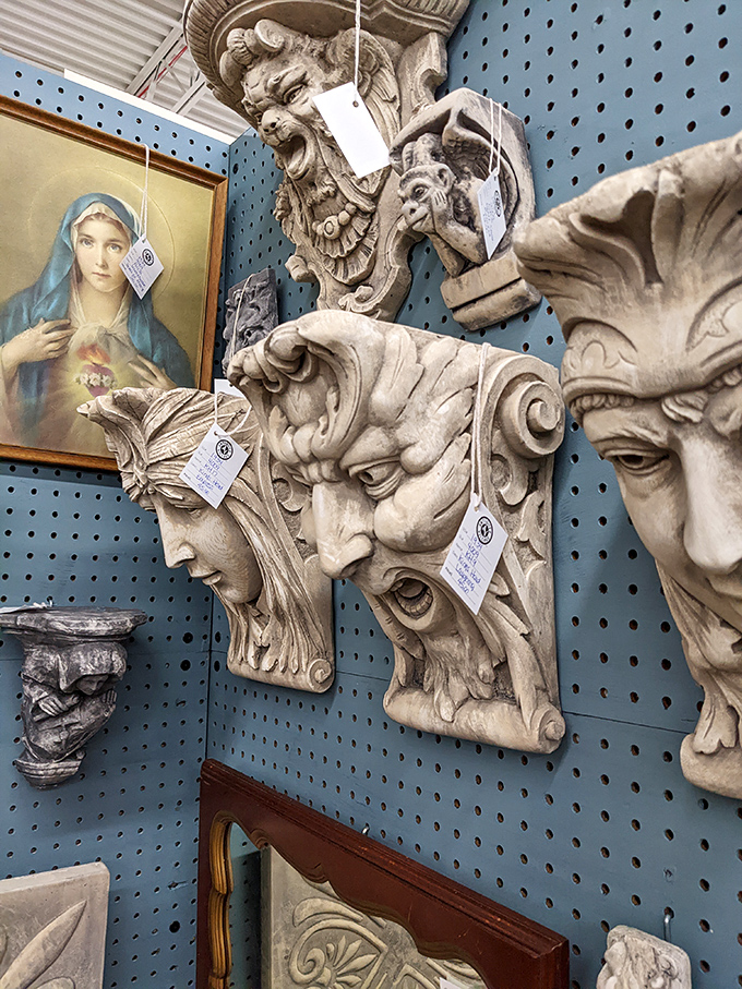 These architectural salvage faces seem to be saying, "Yes, we're creepy, but imagine how interesting your living room wall could be!"