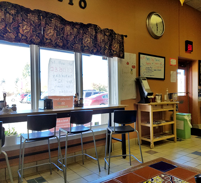 Counter seating with a view&mdash;where you can contemplate life's big questions, like "How many pepperoni rolls is too many?" (Spoiler: there's no such thing).