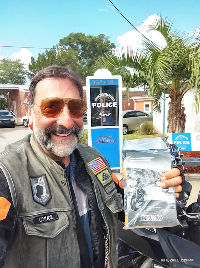 Local law enforcement proudly poses with their world-famous headquarters - a true community treasure and conversation starter.