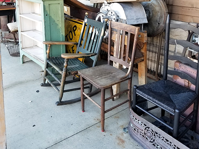 The chair lineup looks like a family reunion of seating &ndash; each with its own personality, patina, and tales of the behinds they've supported.