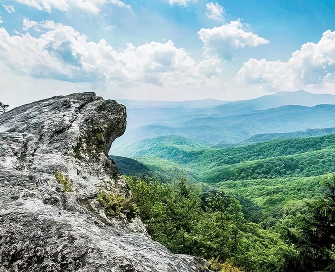 The real edge of the world. Blowing Rock's stone sentinel stands guard over valleys and mountains stretching to eternity.