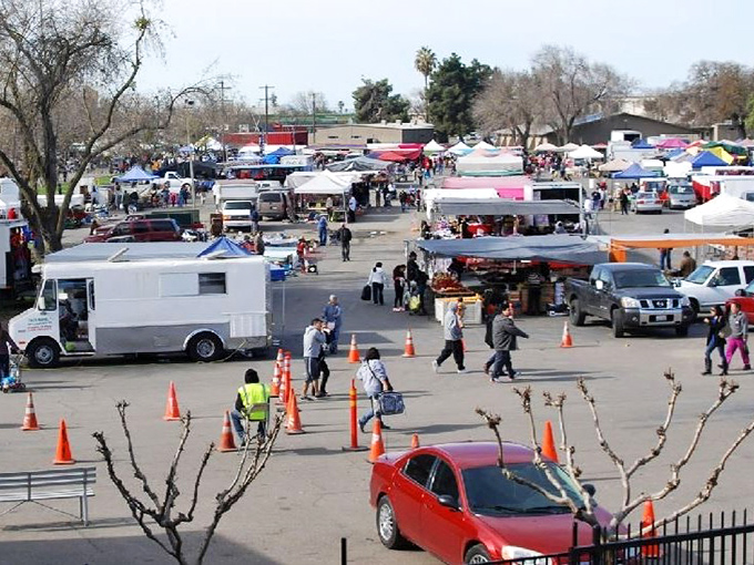 Fairground shopping extravaganza! Stockton's sprawling market transforms parking lots into a bargain hunter's paradise every weekend.