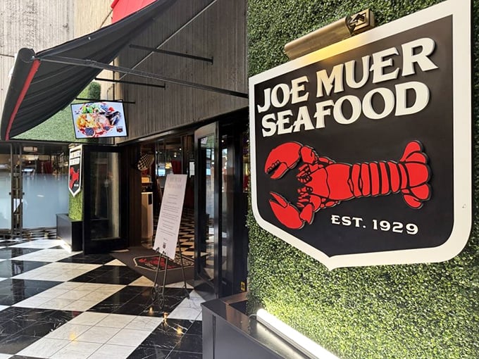 Joe Muer's sleek entrance and iconic red lobster sign &ndash; Detroit's seafood tradition with a modern twist.
