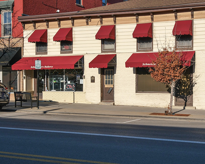 Schneider's Bakery's charming red awnings have sheltered lines of eager donut lovers for decades.
