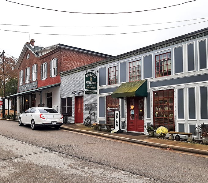 Quaint shops in historic buildings create the perfect small-town scene. The blue and white facades add character to this riverside gem.