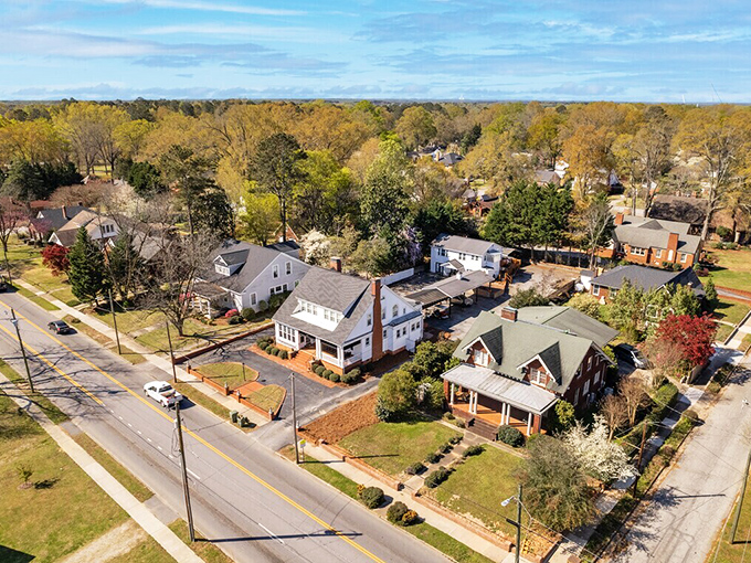 Autumn colors frame Clinton's affordable neighborhoods, where retirement dreams bloom without requiring a fortune to maintain.