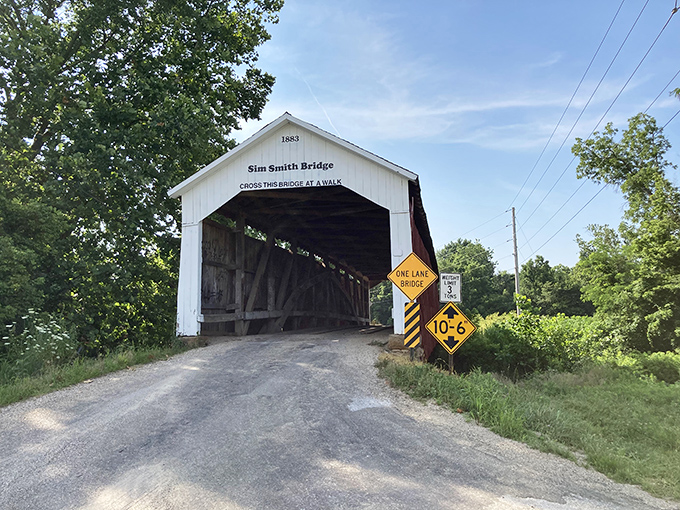 "Cross this bridge at a walk," the sign suggests&mdash;good advice for appreciating this red and white covered passage that's been connecting communities since the horse-and-buggy days.