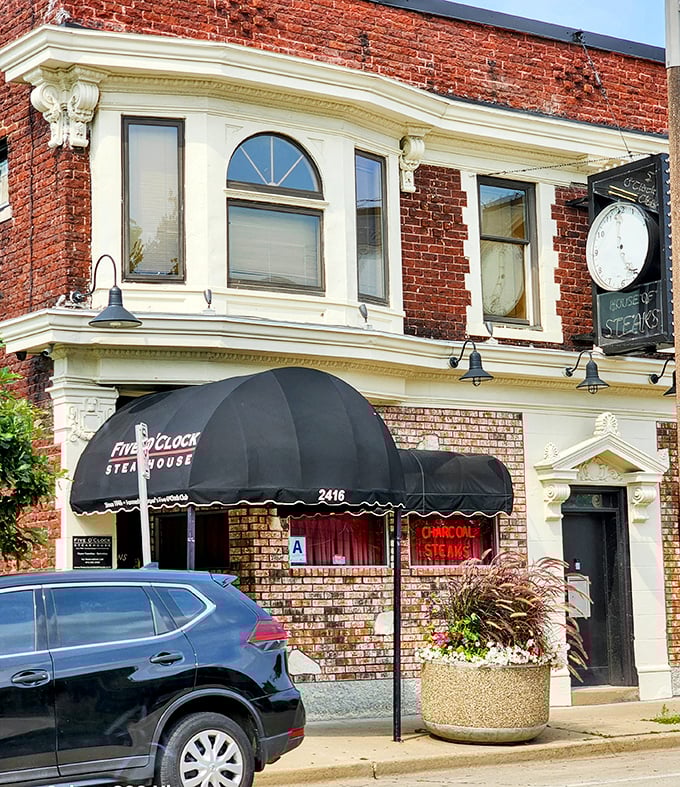 Classic brick and black awnings signal serious steak business. Five O'Clock's exterior is Milwaukee dining history.