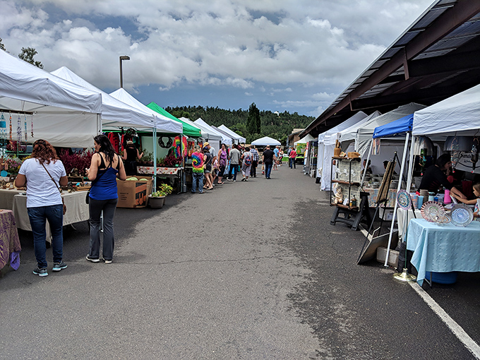 Shoppers stroll between white tents, hunting for that perfect something. Flagstaff's market combines small-town charm with big-time selection.