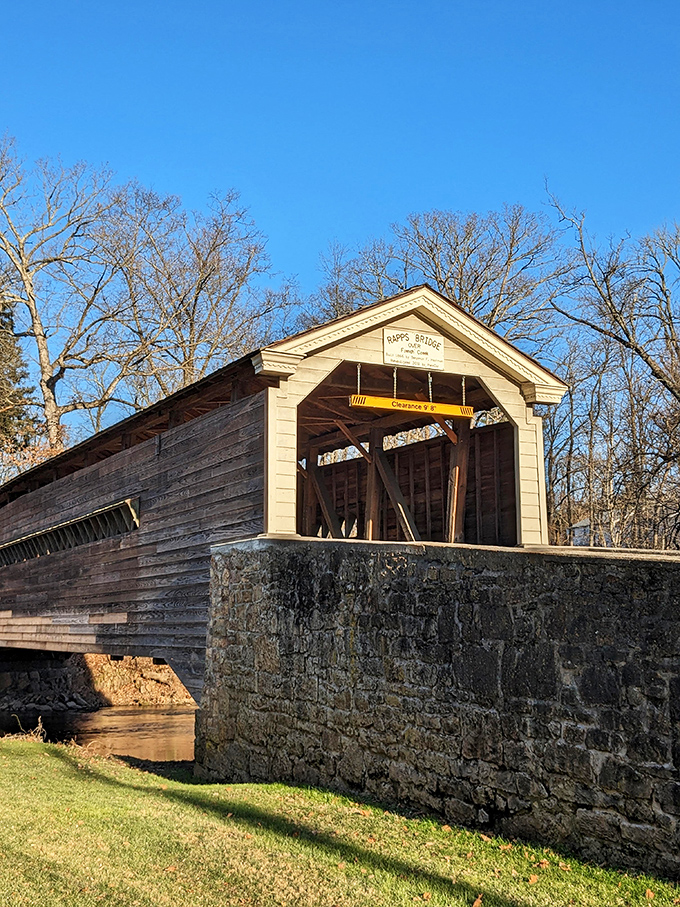 The weathered exterior tells stories of countless crossings&mdash;a wooden time capsule still serving its original purpose with grace.