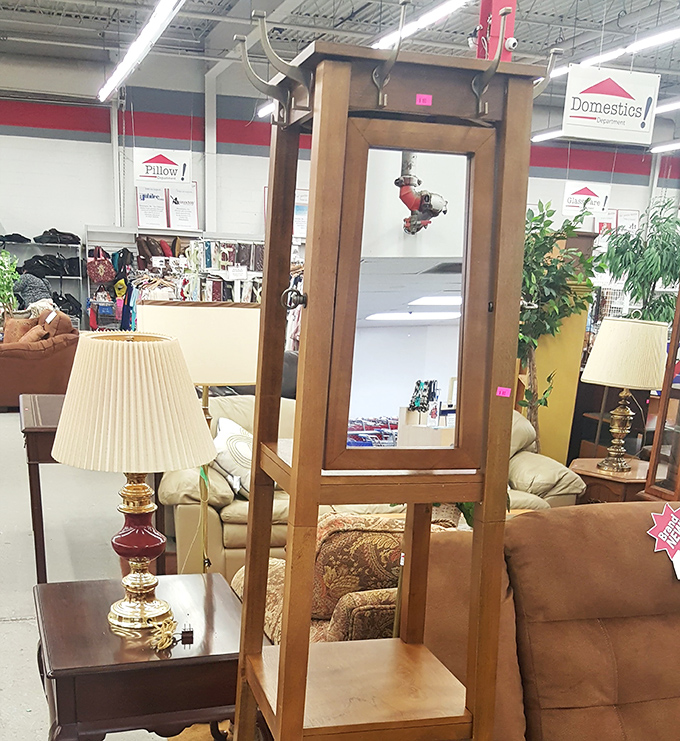 Vintage furniture finds like this wooden display case make Impact Thrift a decorator's dream. One person's discard becomes another's showpiece!