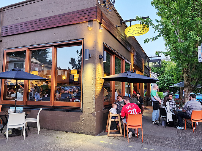 Those wooden picnic tables outside Ken's aren't fancy, but they've hosted more memorable pizza moments than many white-tablecloth restaurants combined.