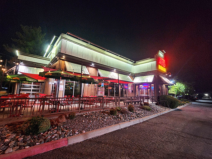 When night falls, Logan's transforms into a carnivore's carnival—where string lights and sizzling plates create meat magic.