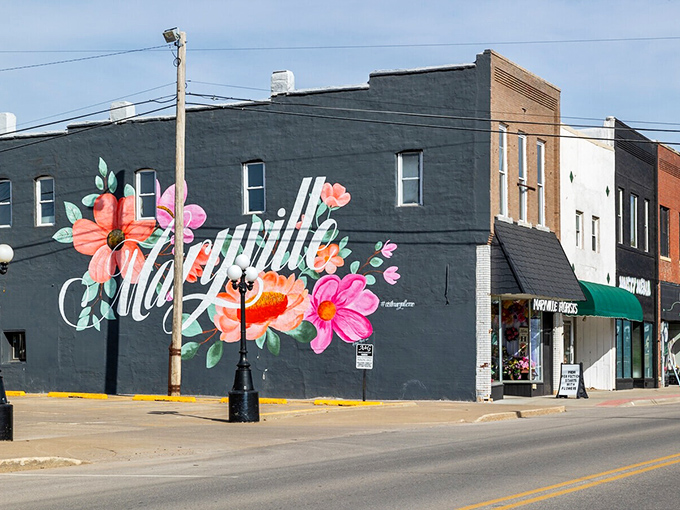 The vibrant Maryville mural blooms with color against brick walls &ndash; street art that captures the town's blossoming spirit.