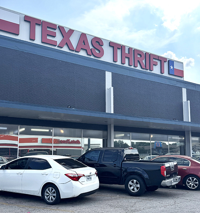 Rain-slicked pavement reflects Texas Thrift's bold signage, a mirror image of the double savings waiting inside.