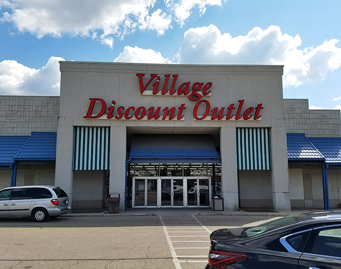 Morning shoppers arrive early at Village Discount Outlet, hoping to be first to discover the day's hidden gems and unbeatable bargains.