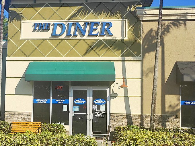 The unassuming storefront of The Diner belies the culinary treasures within. Blue signage and teal awnings welcome hungry patrons to this Boynton Beach gem.