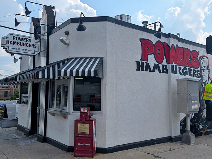 The iconic white building with bold red "POWERS HAMBURGERS" lettering stands like a time capsule in downtown Fort Wayne, beckoning burger lovers since 1940.
