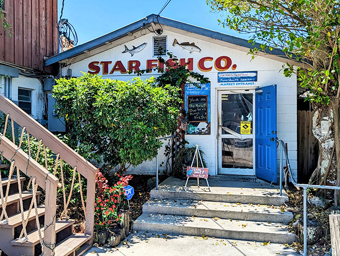 That bright blue door isn't just an entrance &ndash; it's your portal to Gulf Coast seafood paradise.