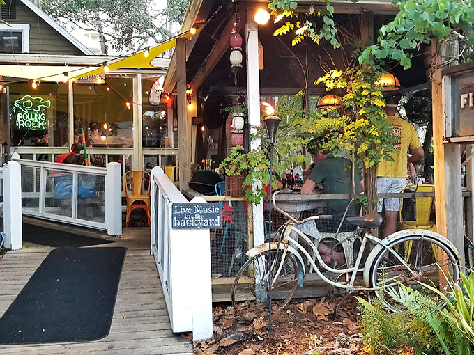 The vintage bicycle out front isn't just decoration—it's a time machine transporting you to Old Florida's golden age of seafood shacks.