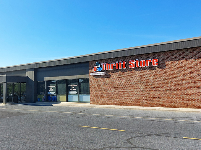 The unassuming brick exterior hides a wonderland of secondhand treasures – like finding Narnia in a strip mall.