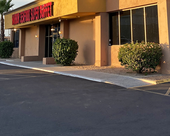 The red sign beckons like a lighthouse for hungry souls adrift in a sea of chain restaurants. Harbor Seafood's modest exterior hides treasures within.