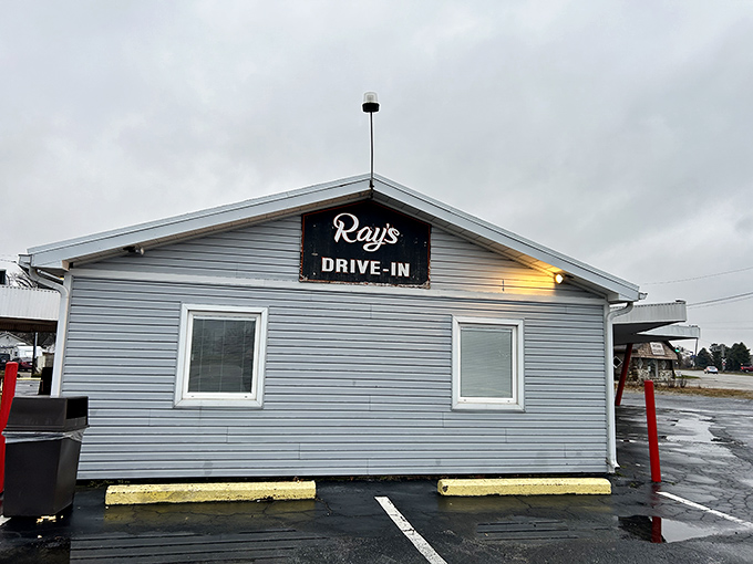The iconic red pillars of Ray's Drive-In stand like sentinels guarding the promised land of tenderloin. Car hop service begins at 10 AM for those who prefer dining al fresco&mdash;in their Buick.