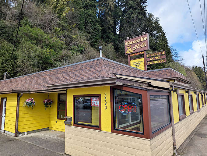 The bright yellow exterior of Pancake Mill isn't trying to win architectural awards&mdash;it's too busy perfecting breakfast. This cheerful roadside beacon has "slam on your brakes" written all over it.
