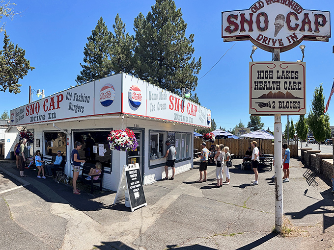 The unassuming white building with its classic red signage promises two of life's greatest pleasures: homemade ice cream and old-fashion burgers.