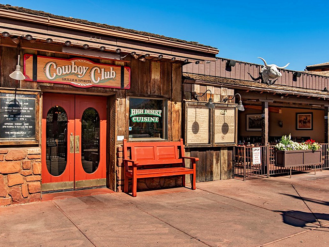 This weathered wooden facade whispers tales of cowboys and cattle drives while promising modern culinary adventures inside.