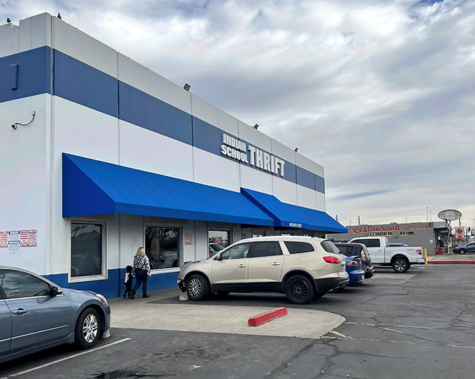 The unmistakable blue-and-white facade of Indian School Thrift stands like a desert oasis for bargain hunters. Arizona's finest, indeed!