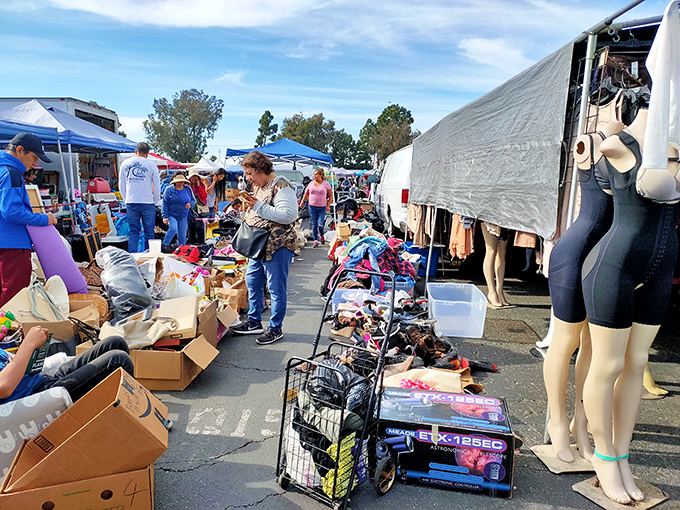 Welcome to treasure hunter paradise! Colorful canopies shelter an asphalt wonderland where one person's castoffs become another's prized discoveries.