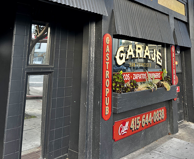 The unassuming black-tiled exterior of Garaje hides culinary treasures within, like a speakeasy for your taste buds.