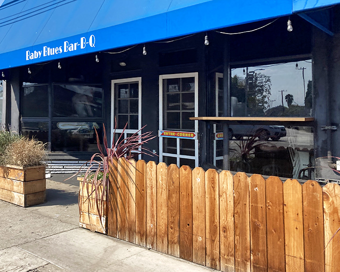 The bright blue awning of Baby Blues BBQ stands out on Venice's Lincoln Boulevard like a beacon for hungry barbecue pilgrims.