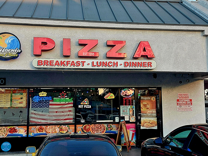 The unassuming storefront that houses culinary treasures. Bold red letters and an American flag promise simple pleasures that exceed all expectations.