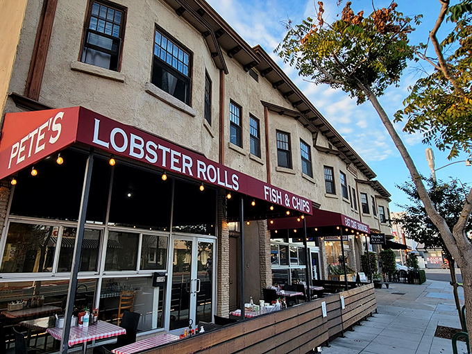 Pete's iconic red awning beckons seafood lovers like a lighthouse guiding hungry sailors home. The outdoor seating practically whispers "sit here and watch the world go by."