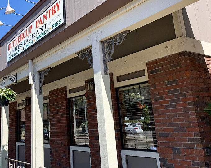 The brick facade of Buttercup Pantry stands as a beacon of breakfast hope on Placerville's Main Street, promising comfort food salvation to hungry travelers.