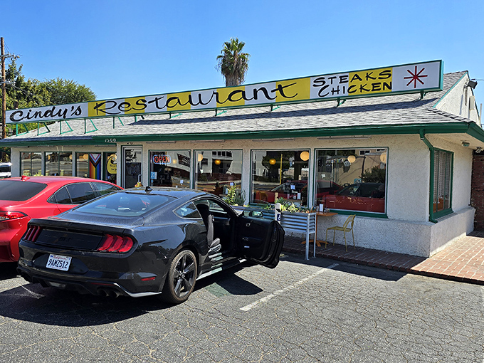 The sunshine-yellow sign beckons like a time machine to simpler days, when comfort food wasn't ironic and calories didn't count on vacation.