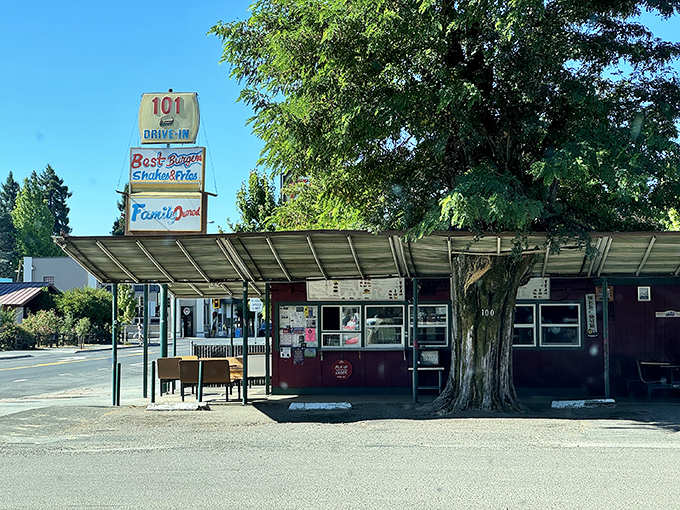 The iconic 101 Drive-In sign stands tall against the California sky, promising burger bliss to weary travelers and locals alike.