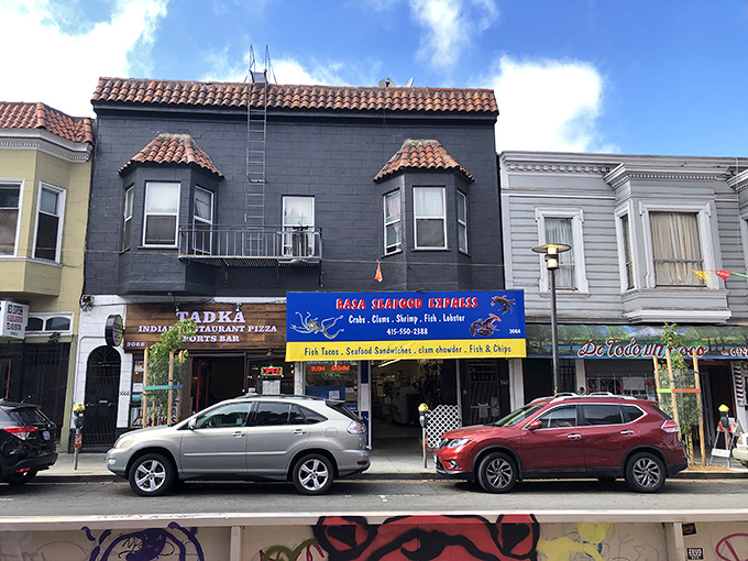 The unassuming blue awning of Basa Seafood Express stands out on Mission Street like a maritime beacon, promising oceanic treasures within its modest storefront.