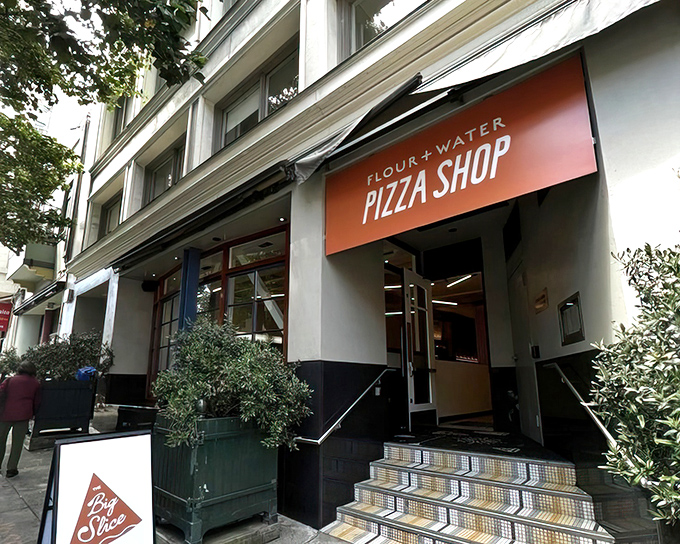 The bright orange sign beckons like a pizza lighthouse in San Francisco's Mission District. Simple, unpretentious, and promising delicious things inside.