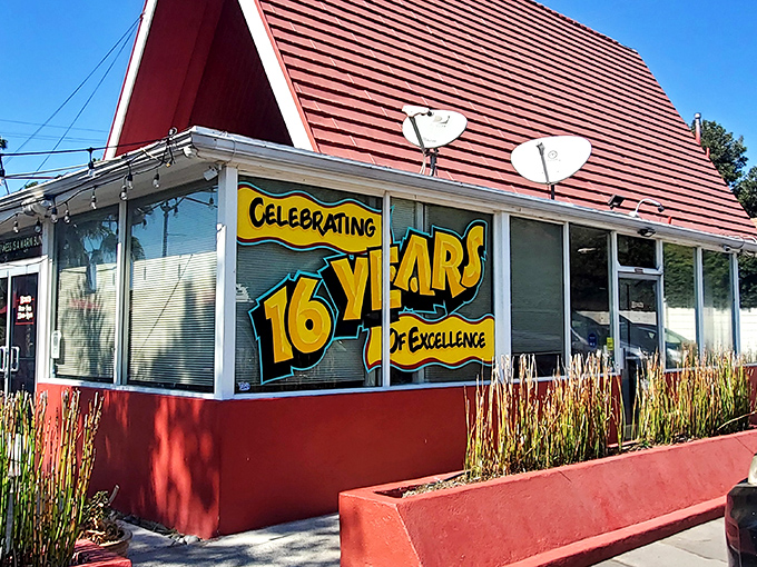 The iconic A-frame roof of The Oinkster stands as a beacon of culinary delight in Eagle Rock, promising retro charm and modern flavors.