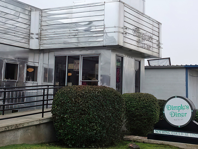 The classic chrome exterior of Dimples Diner stands like a time capsule in Visalia, promising nostalgic flavors and hospitality inside.
