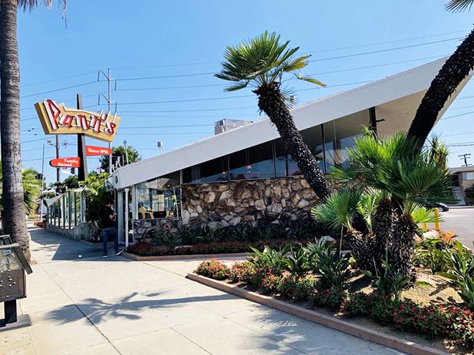 That iconic neon sign isn't just calling you to breakfast&mdash;it's beckoning you back to an era when diners were social hubs and architectural statements rolled into one delicious package.